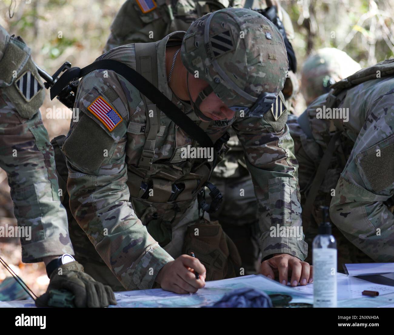 A soldier assigned to the 3rd Infantry Division determines their ...