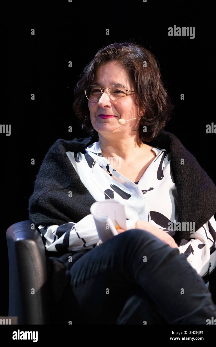 Cologne, Germany. 01st Mar, 2023. Editor Isabel Schayani sits on stage ...