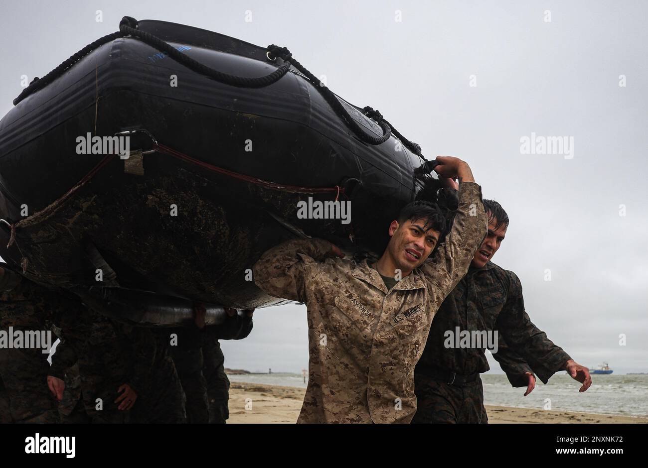 U.S. Marine Corps Sgt. Domingo Arevalo III, leads his team to build ...