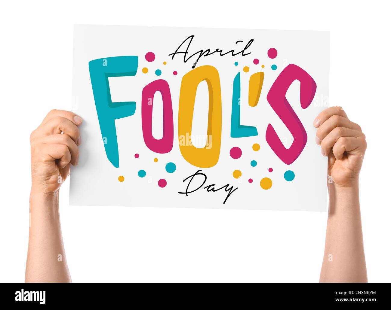 Hands holding poster with text APRIL FOOLS DAY on white background ...