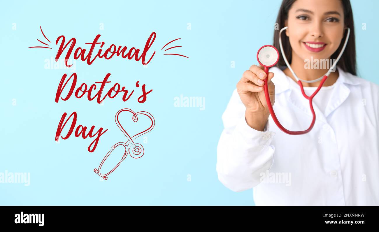 Female cardiologist on light blue background. National Doctors Day ...