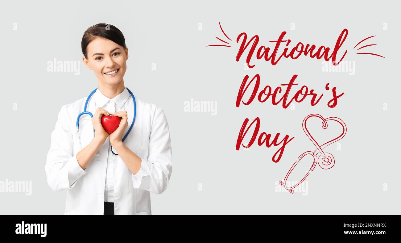 Female cardiologist on light background. National Doctors Day Stock ...