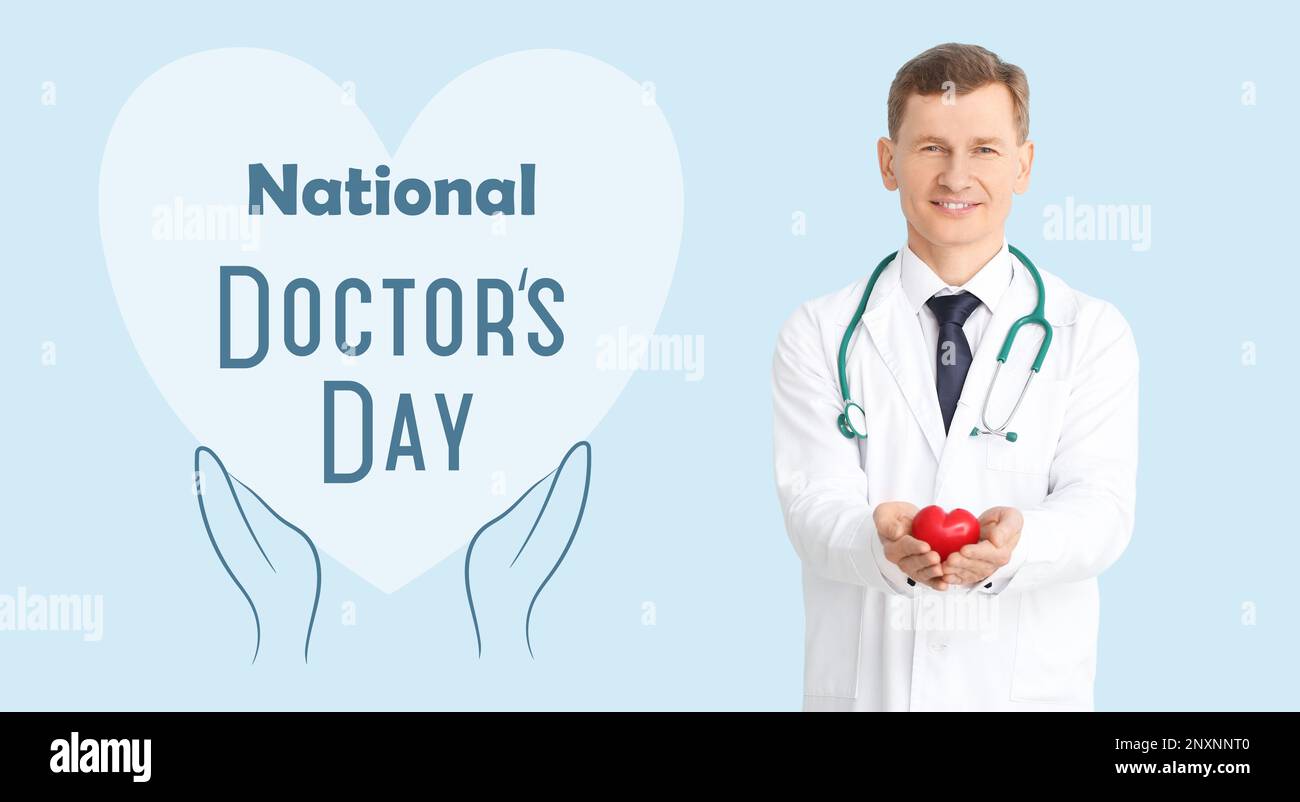Male cardiologist on light blue background. National Doctors Day Stock ...