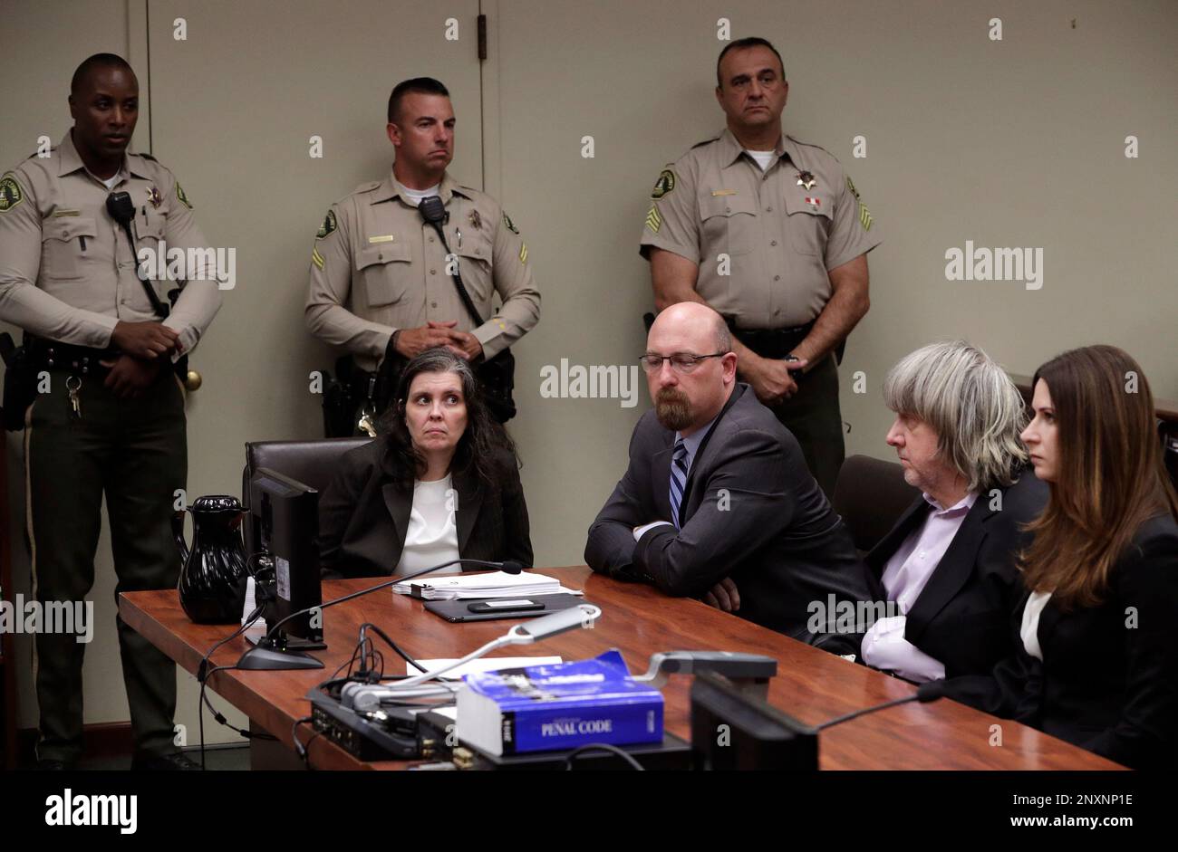 Louise Anna Turpin, left, with her attorney Jeff Moore, and her husband ...