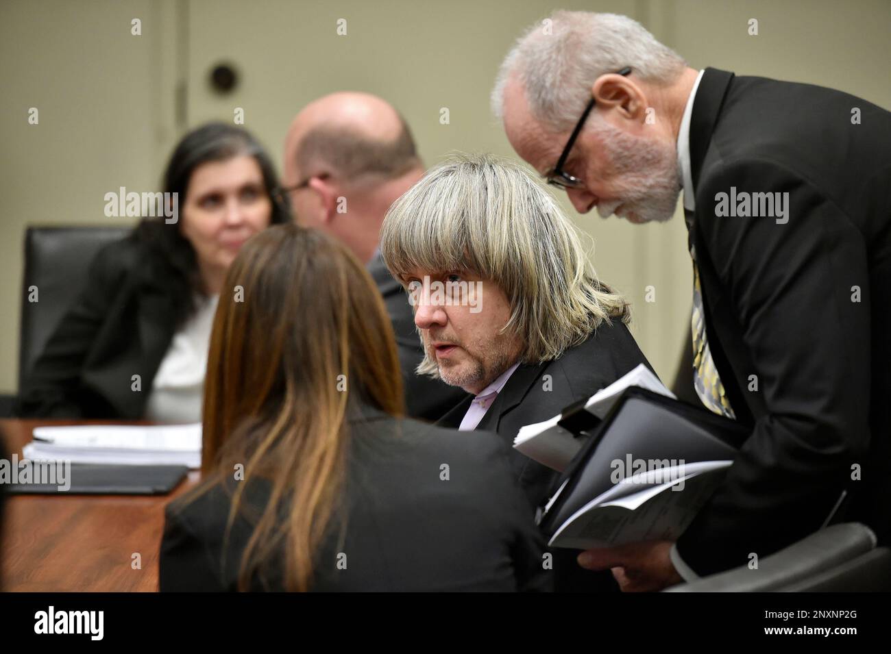 David Allen Turpin, second from right, and his attorney David Macher ...