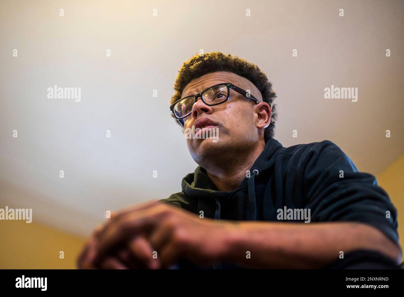 In this Jan. 5, 2018 photo, Cory Butler sits in the living room of Rod ...
