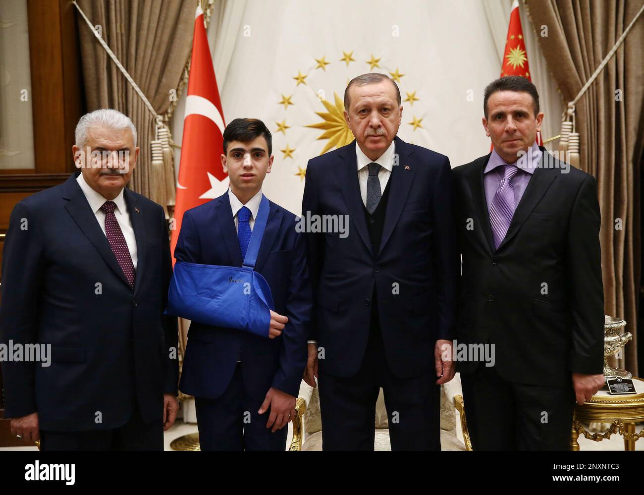 Turkey's President Recep Tayyip Erdogan, second right, Prime Minister ...