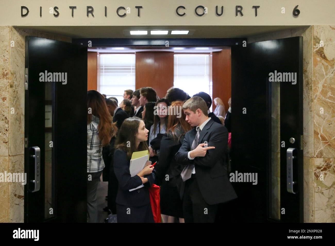 Jenks students Lesley Dalrymple and Andrew Spinner talk while outside ...