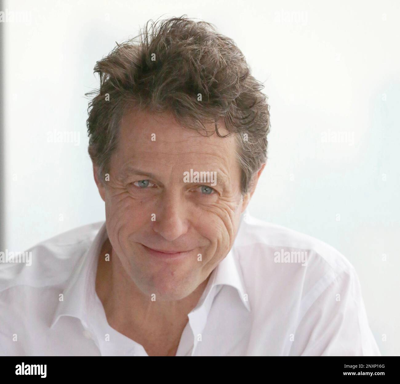 British actor Hugh Grant speaks during an interview in Tokyo on Jan.17 ...
