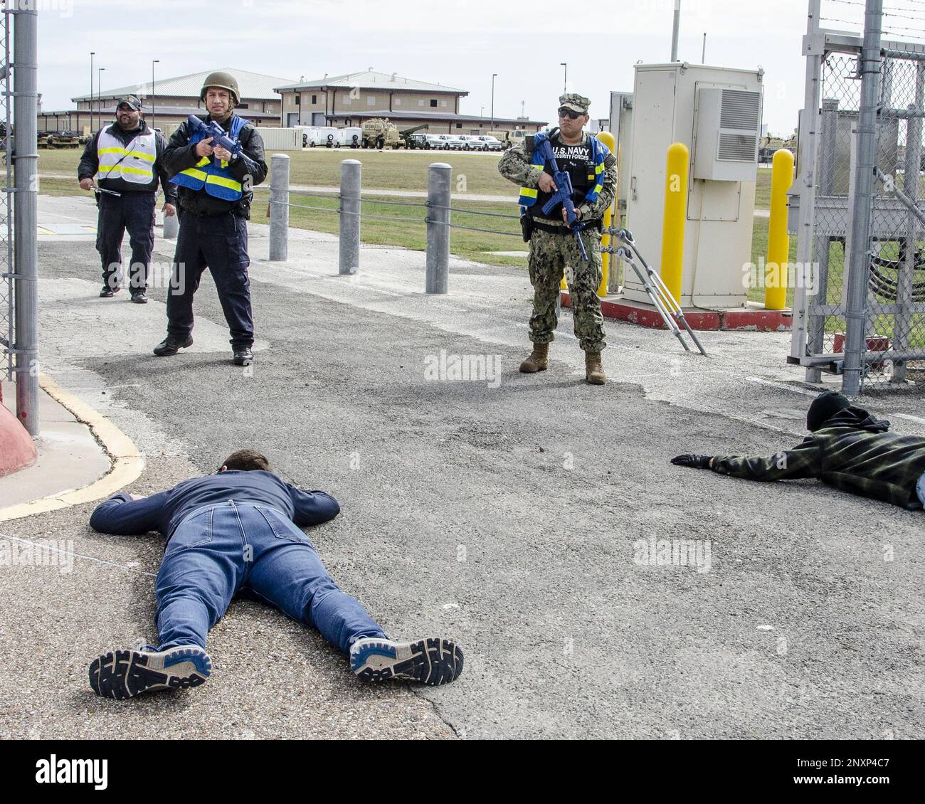 Simulated protestors who charged the Naval Air Station Kingsville back ...