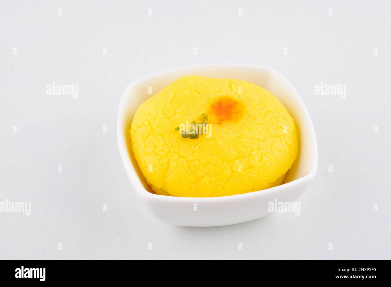 Cham Cham sweet in bowl isolated on white background Stock Photo - Alamy