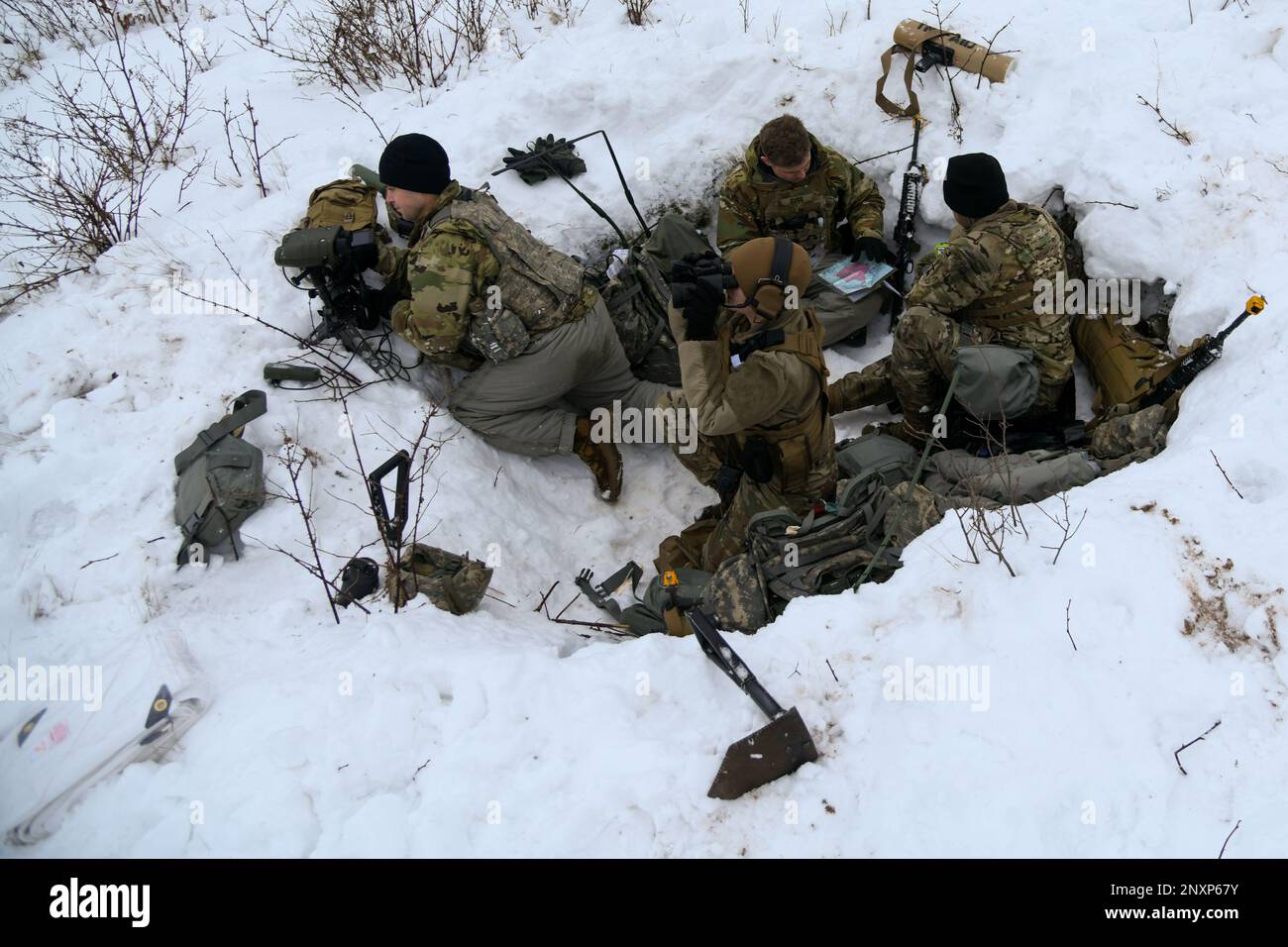 A team of 1-120th Field Artillery Regiment forward observers spot ...