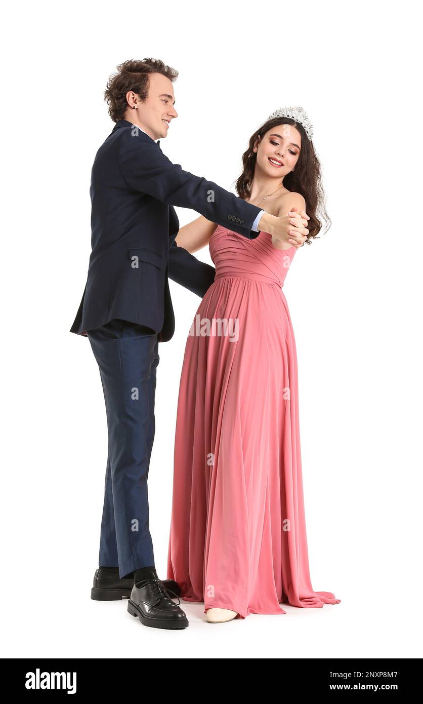 Beautiful couple dressed for prom dancing on white background Stock ...