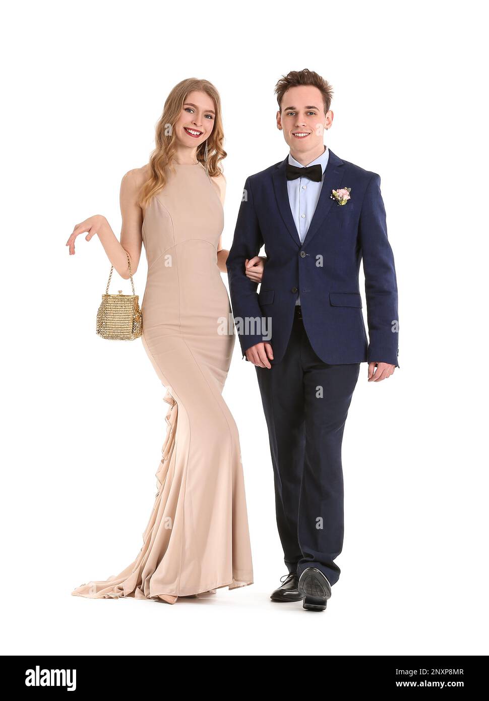 Beautiful couple dressed for prom on white background Stock Photo - Alamy