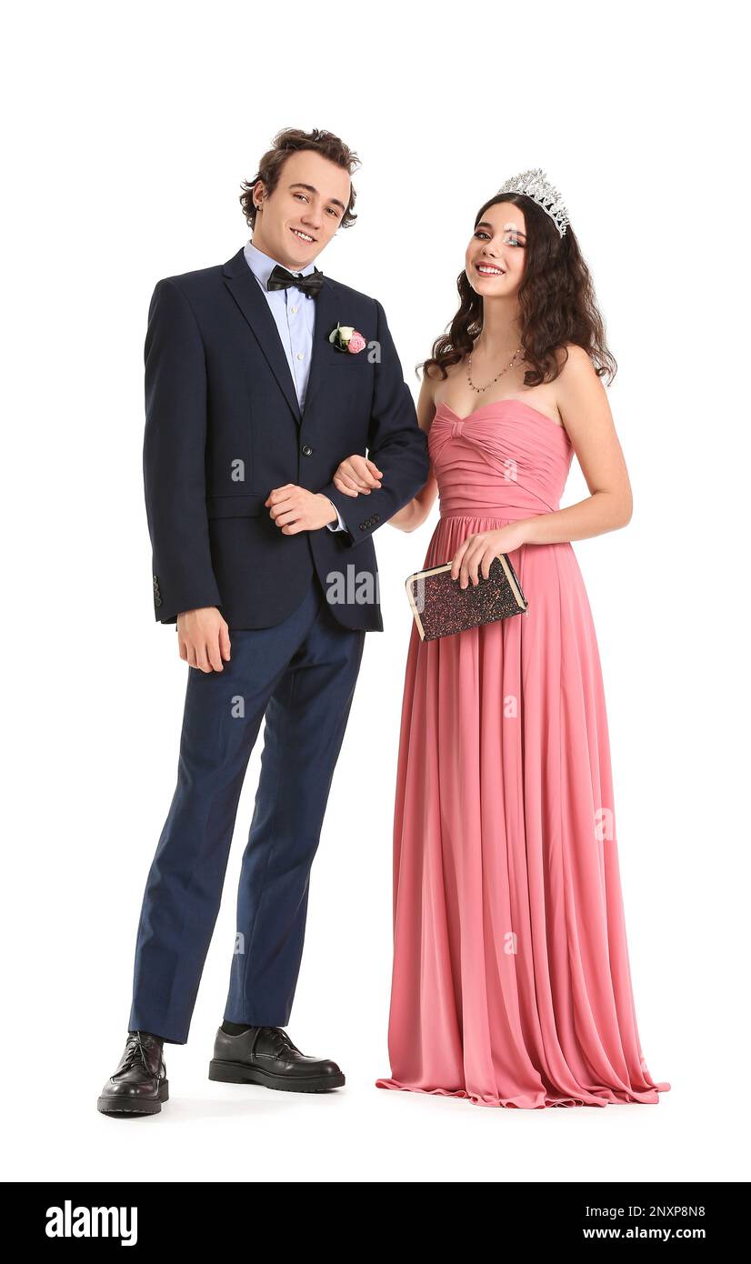 Beautiful couple dressed for prom on white background Stock Photo - Alamy