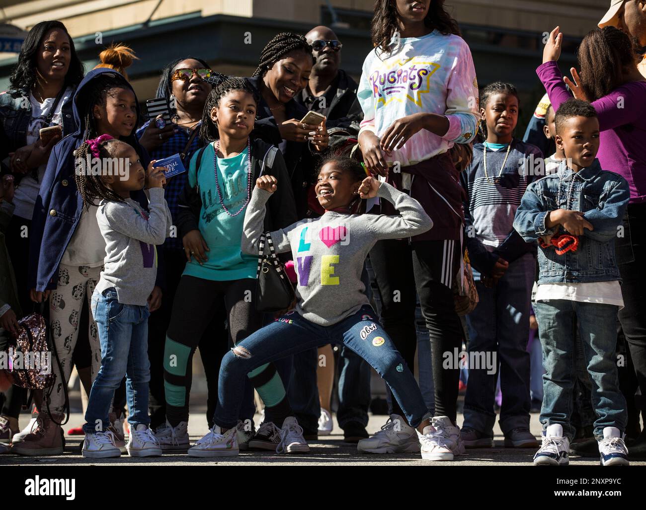 People line Texas Avenue to watch a parade honoring slain civil rights ...