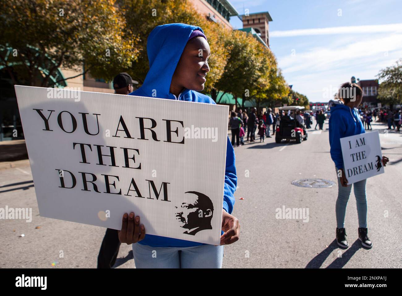 Breann Aldridge marches in a parade honoring slain civil rights leader ...
