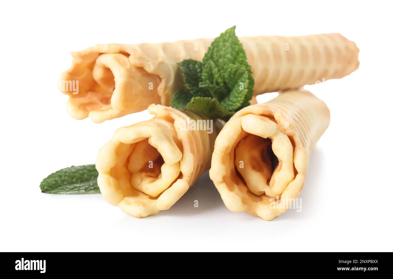 Delicious wafer rolls with mint isolated on white background Stock ...