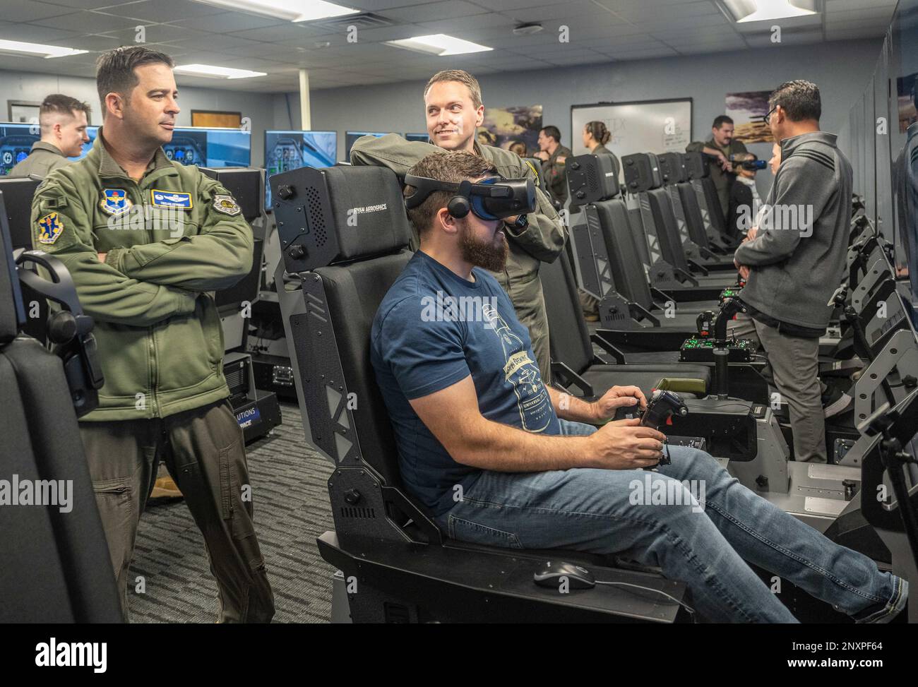 Col. Taylor Ferrell, 12th Flying Training Wing commander, looks on as ...