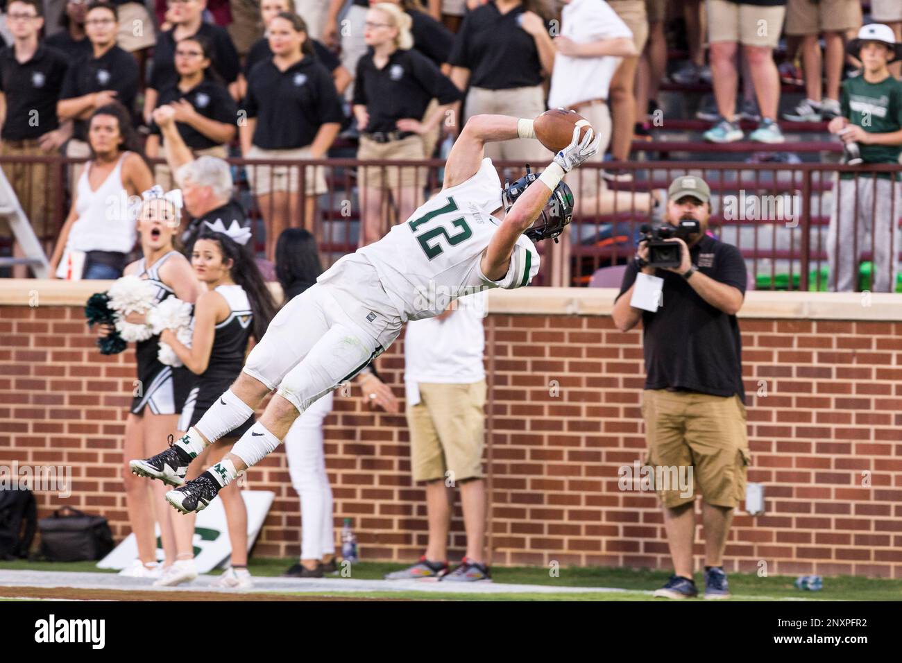 NORMAN, OK - AUGUST 31 : Norman North High School Drake Stoops (12) at ...