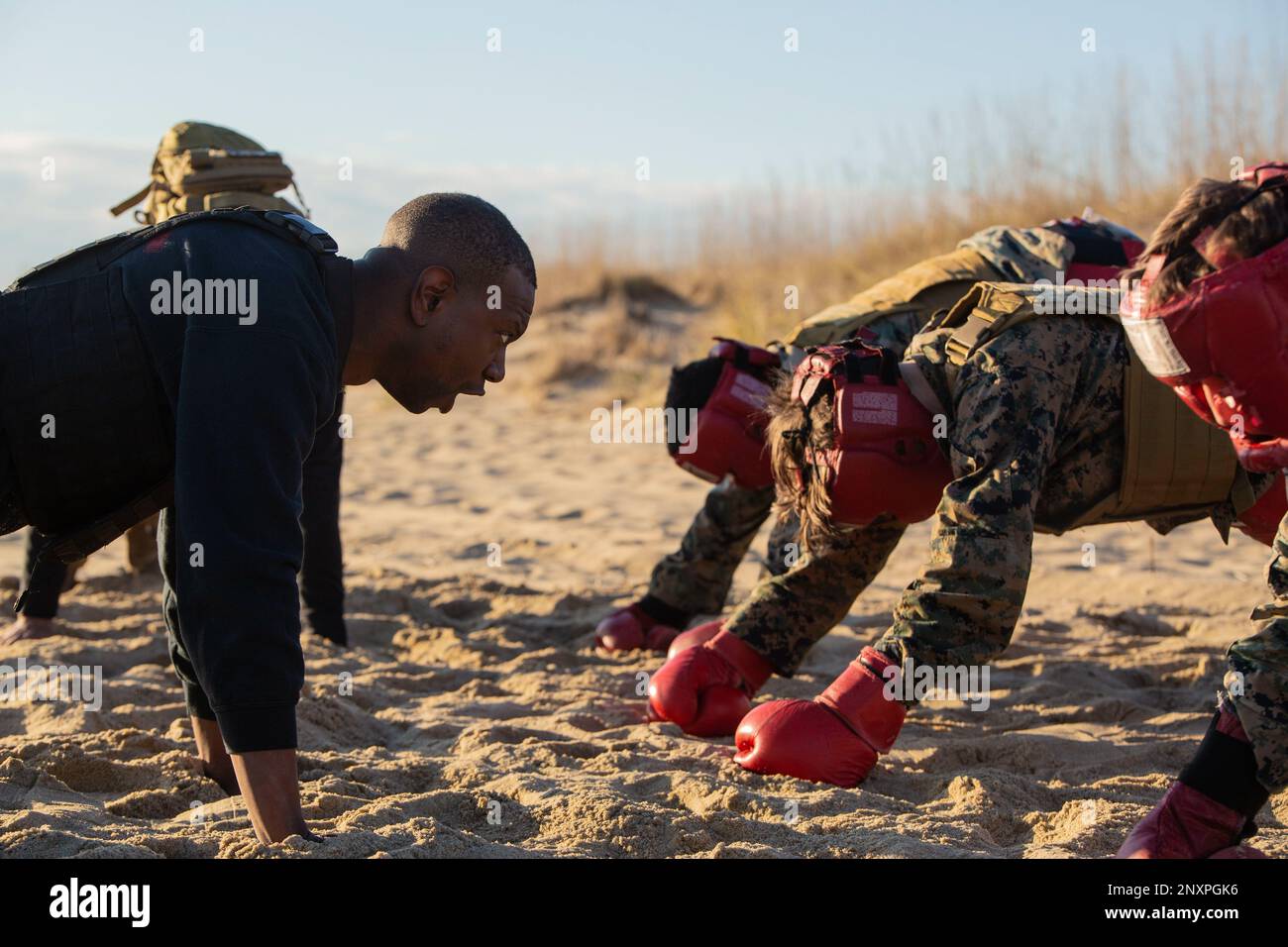 U.S. Marine Corps Gunnery Sgt. Jonathan L. Godley, left, a theater ...