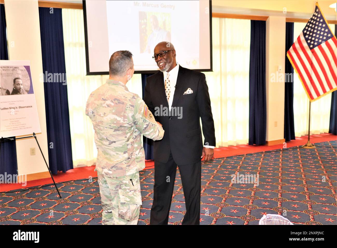 Guest speaker Marcus Gentry receives a special appreciation plaque from ...