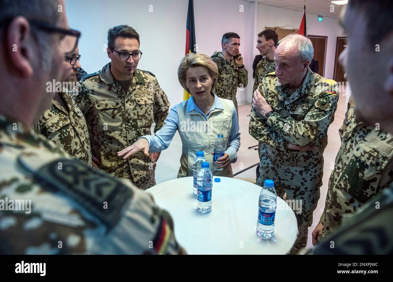 German Defence Minister Ursula von der Leyen, centre, speaks to German ...