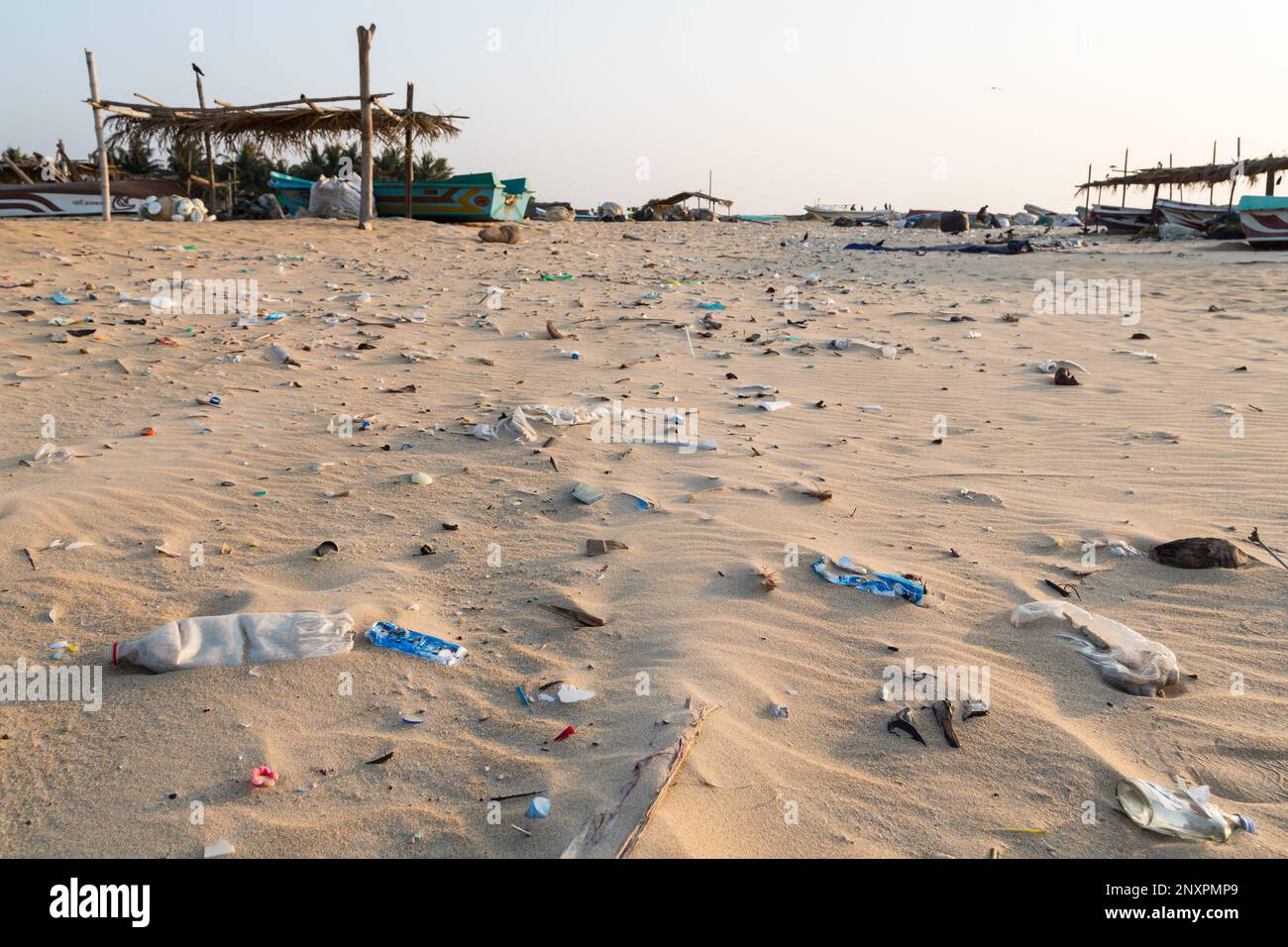 Plastic and other trash litters an area of Negombo Beach, Sri Lanka ...