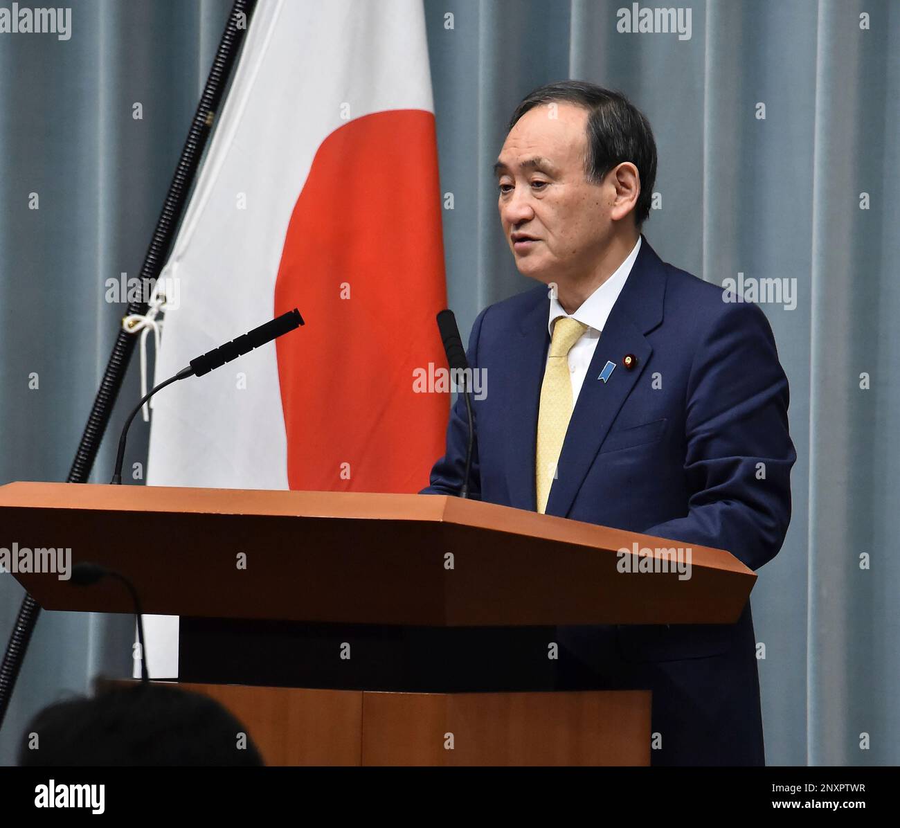 Chief Cabinet Secretary Yoshihide Suga attend a press conference at ...