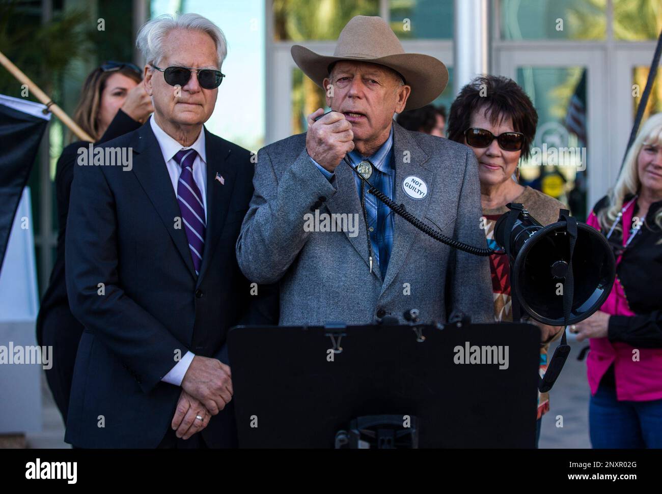 Attorney Larry Layman stands by client Cliven Bundy and his wife Carol ...