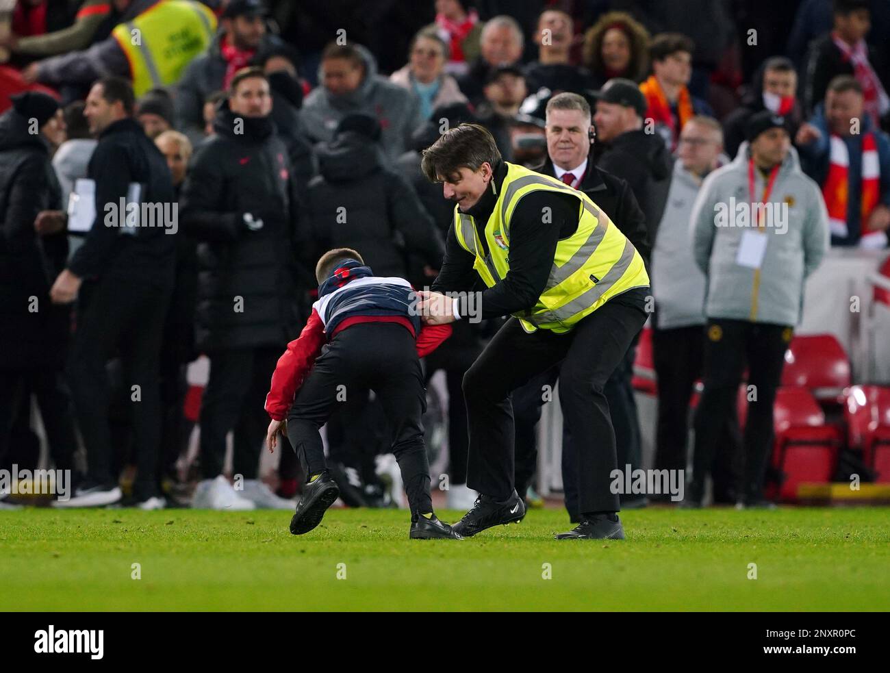 A young pitch invader is stopped in his tracks following the Premier ...