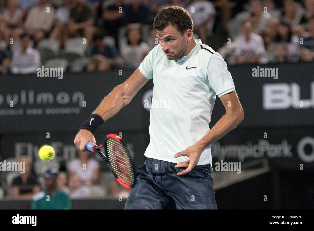 SYDNEY, NSW - JANUARY 8: Grigor Dimitrov (BUL) hits a backhand at the ...