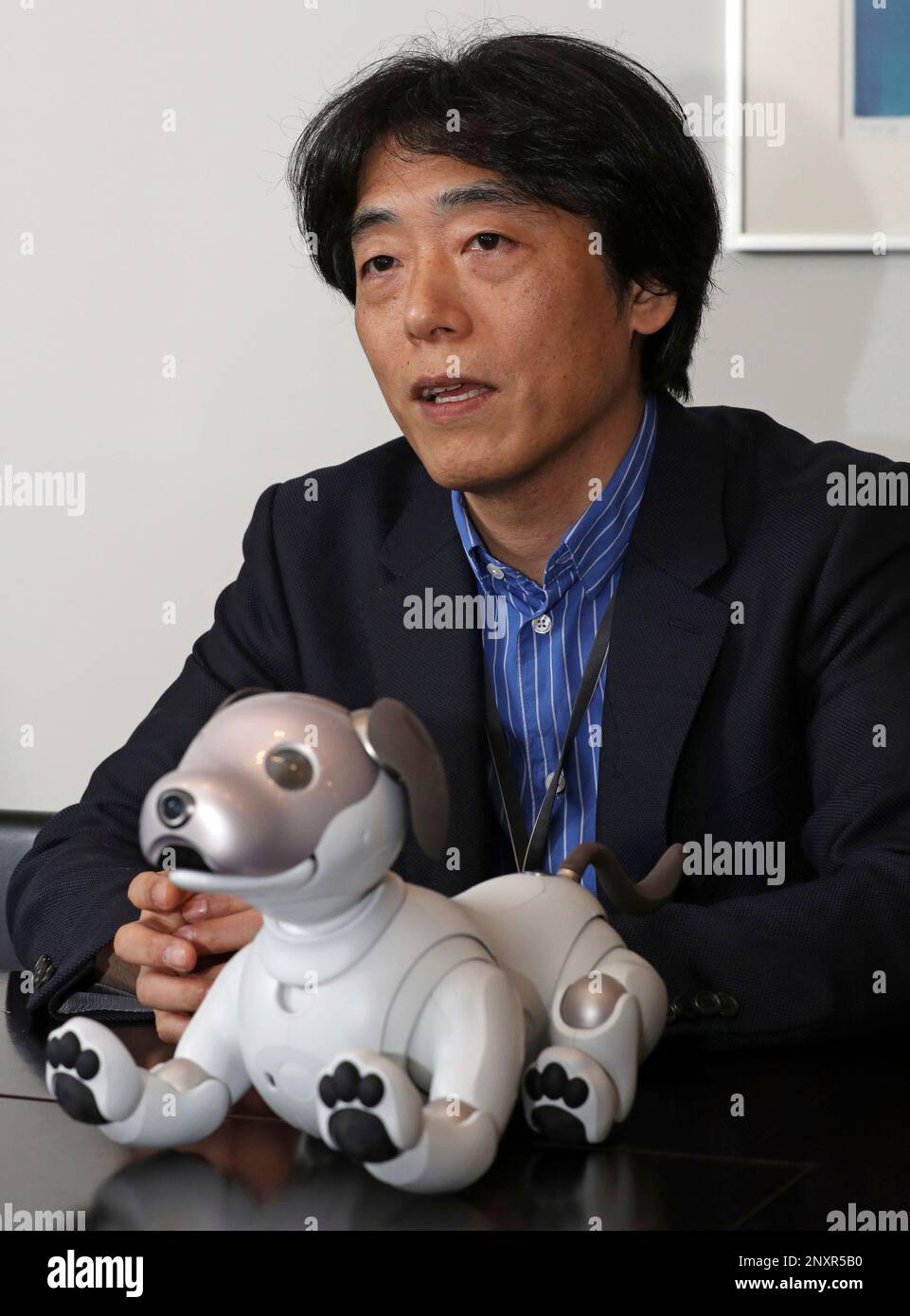 Izumi Kawanishi, head of Sony's AI Robotics Business Group, speaks alongside new Aibo in Tokyo ...