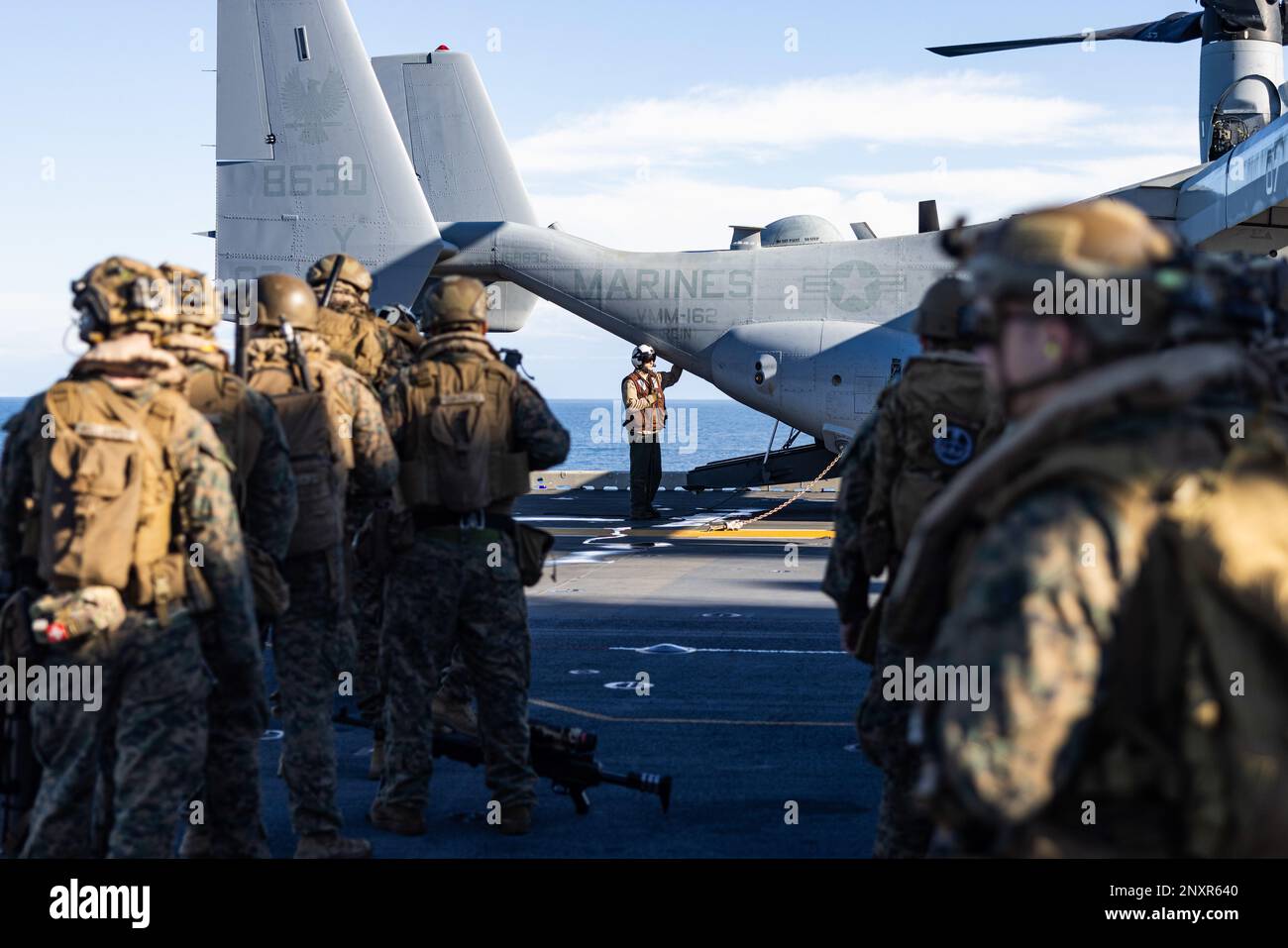 U.S. Marines assigned to Battalion Landing Team 1/6 prepare to board a ...