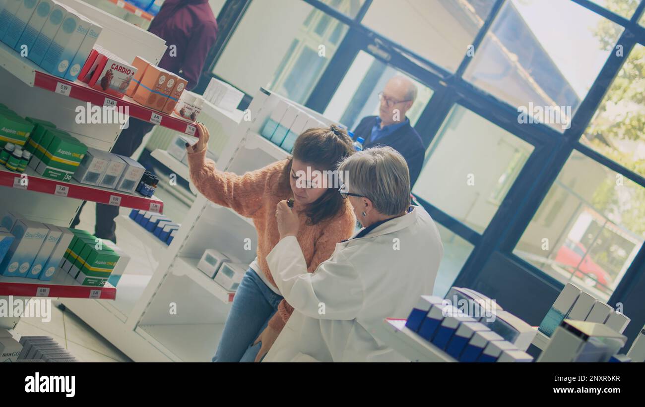 Female client losing balance and feeling dizzy in drugstore, asking for ...