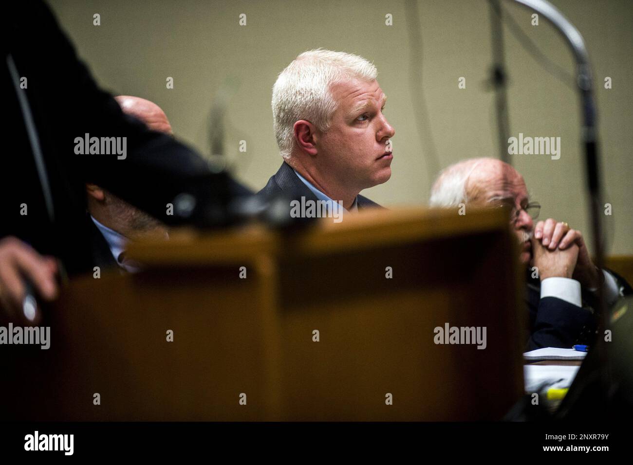 Defendant Stephen Busch listens in as Special Prosecutor Todd Flood ...