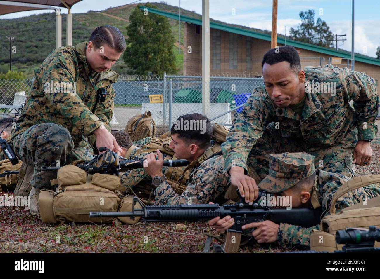 U.S. Marines prepare their Rifle Combat Optics before they enter ...