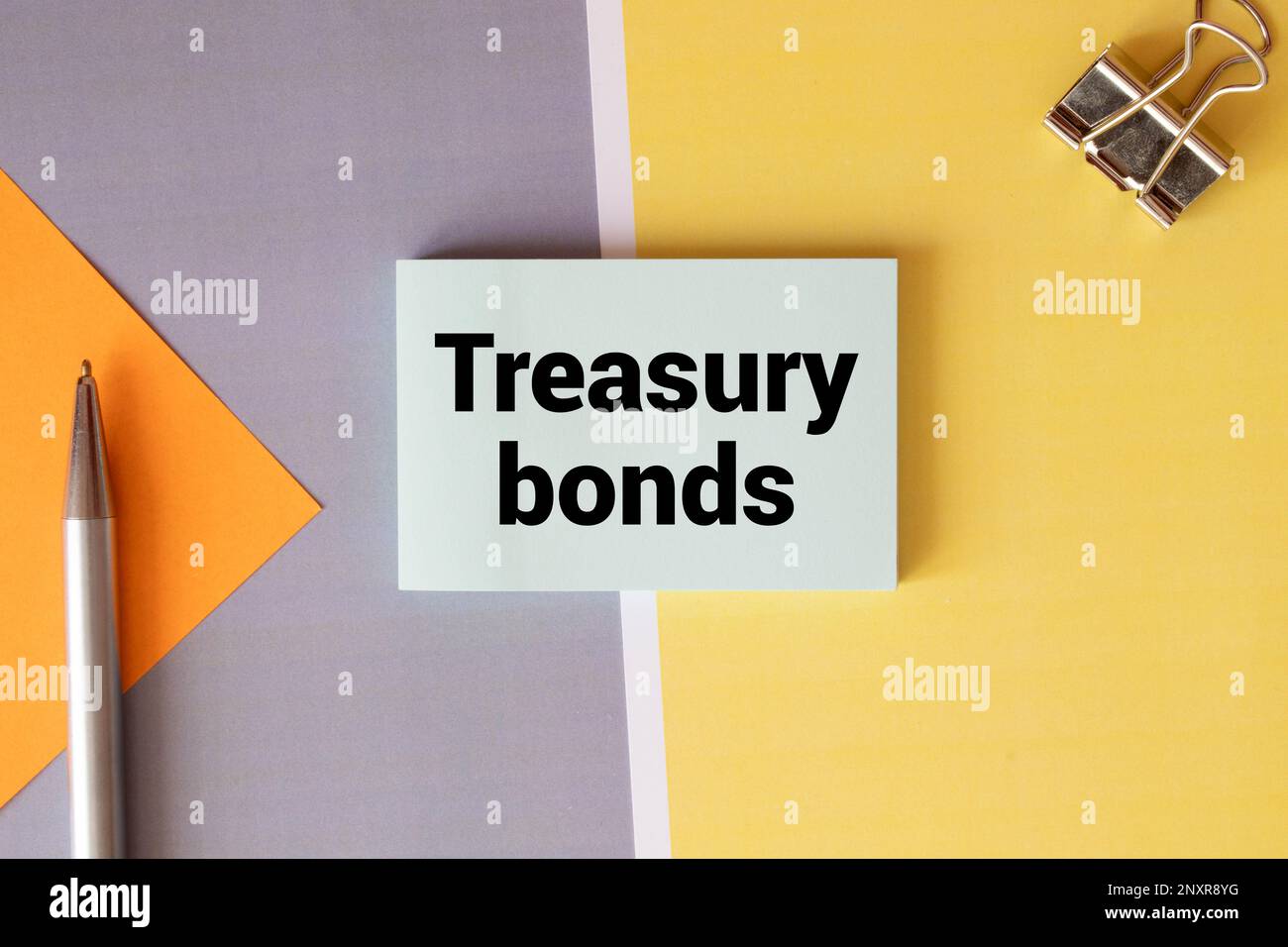 Papers with text, treasury bonds on a table, business concept Stock ...