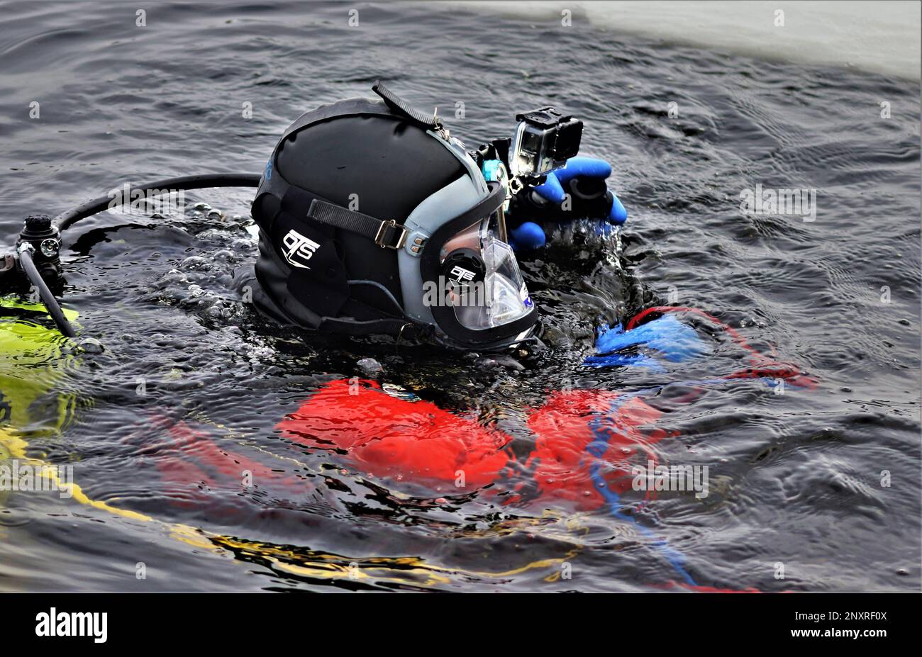 A firefighter with the Directorate of Emergency Services Fire ...