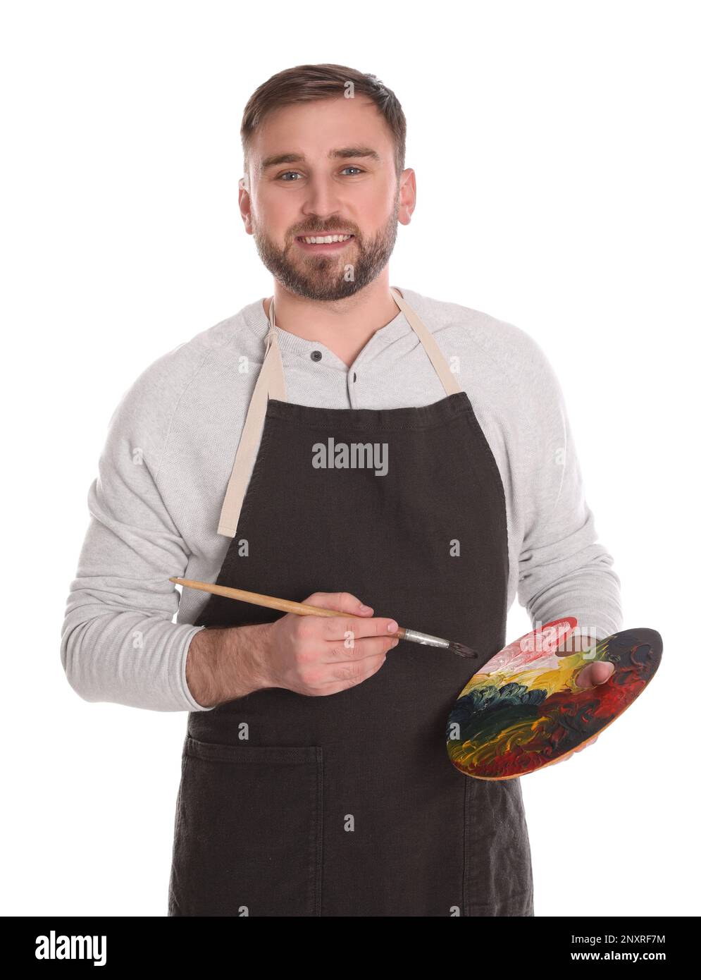 Man with painting tools on white background. Young artist Stock Photo ...