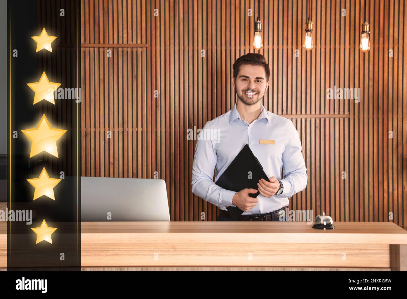 Five Star Luxury Hotel. Portrait of receptionist at desk in lobby Stock ...