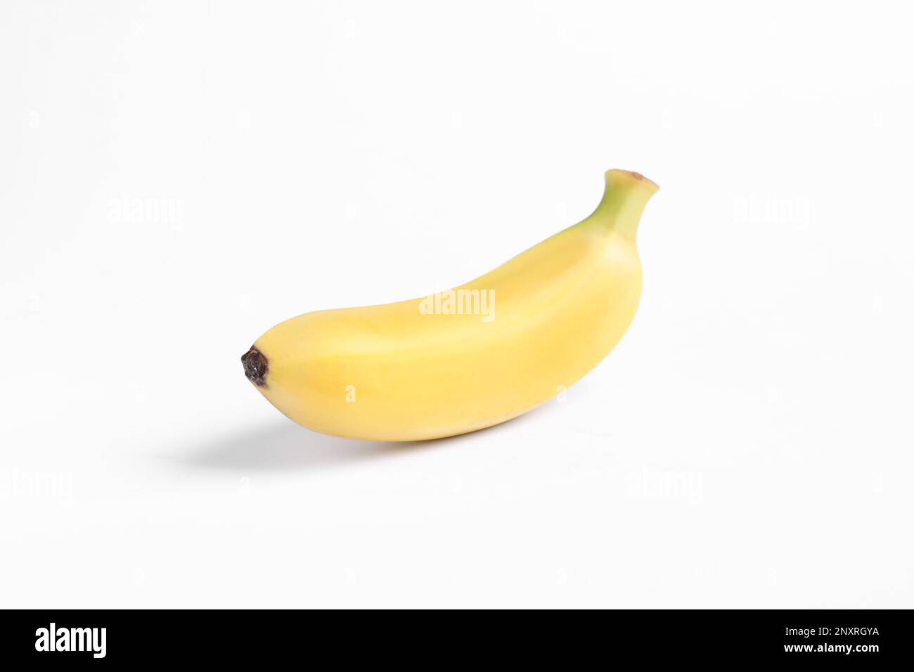 Baby eating banana Cut Out Stock Images & Pictures - Alamy