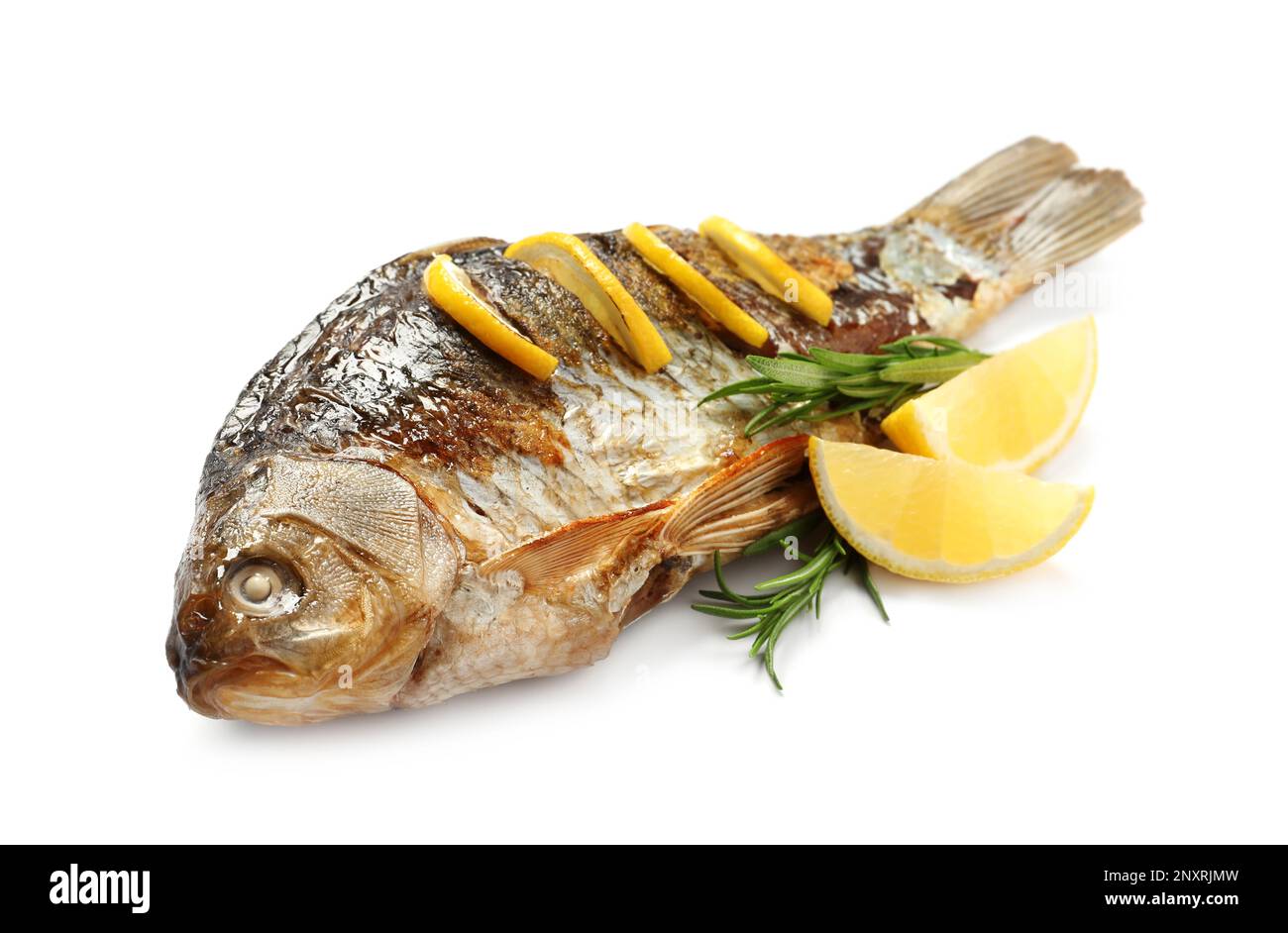 Tasty homemade roasted crucian carp with rosemary and lemon on white ...