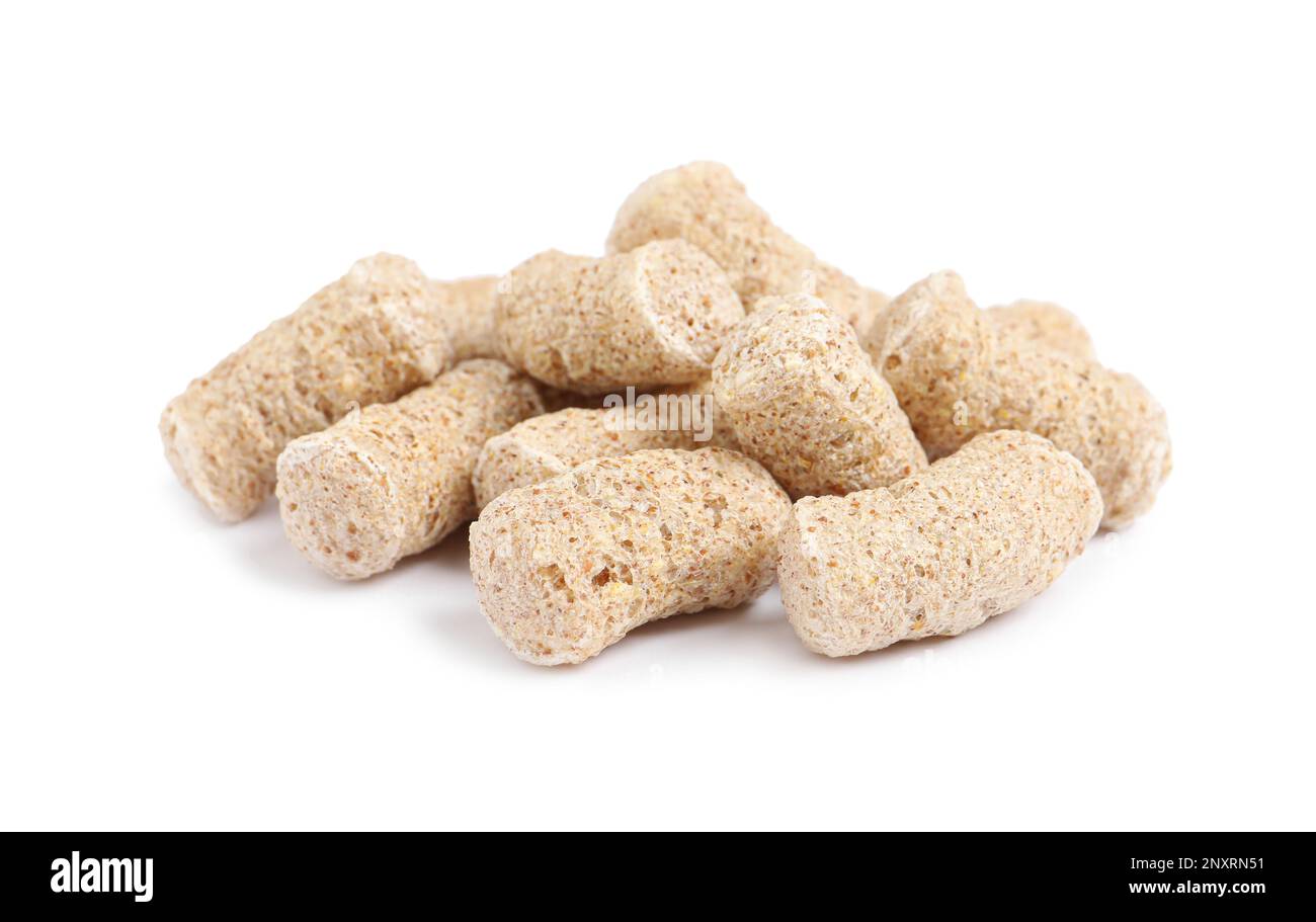 Pile of granulated wheat bran on white background Stock Photo - Alamy
