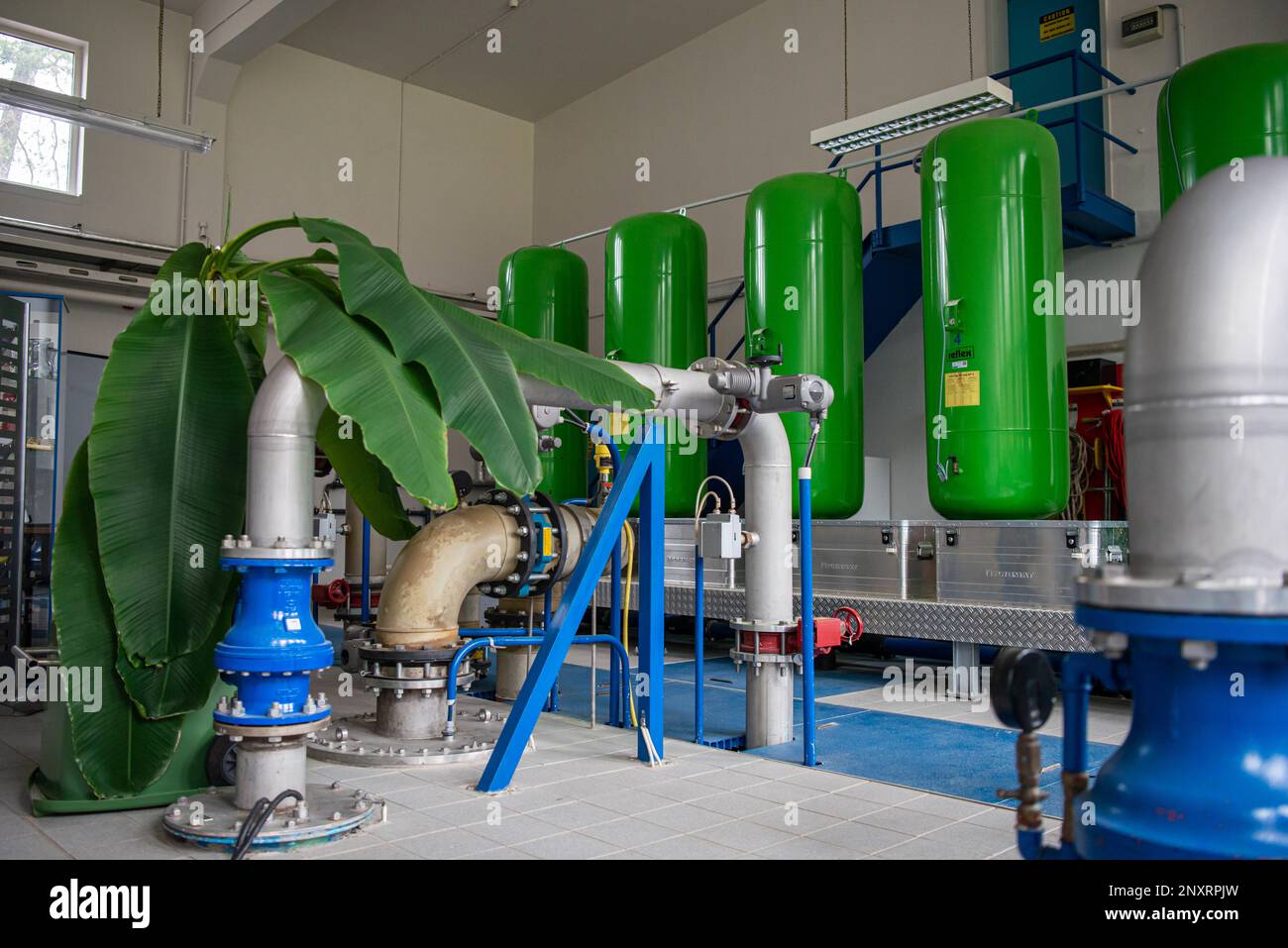 Diaphragm tanks sit in the main lobby of the water treatment facility ...