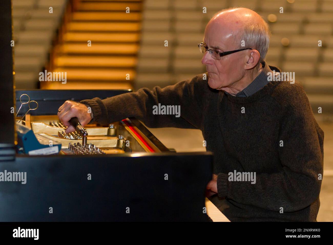 Richard Gorden tunes the 9' Steinway grand piano at the McHale ...