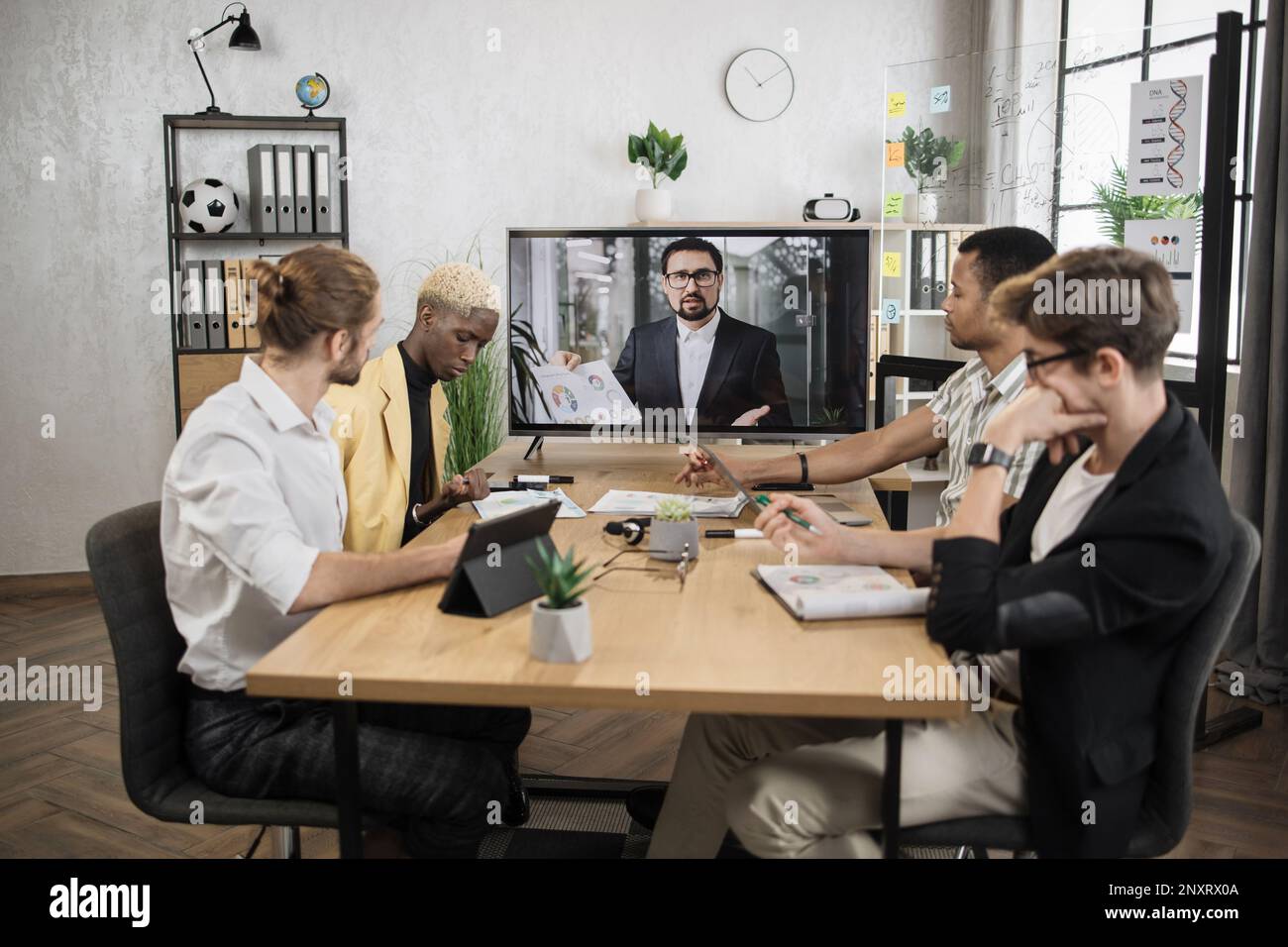 Confident young bearded caucasian man tells business program concept to ...