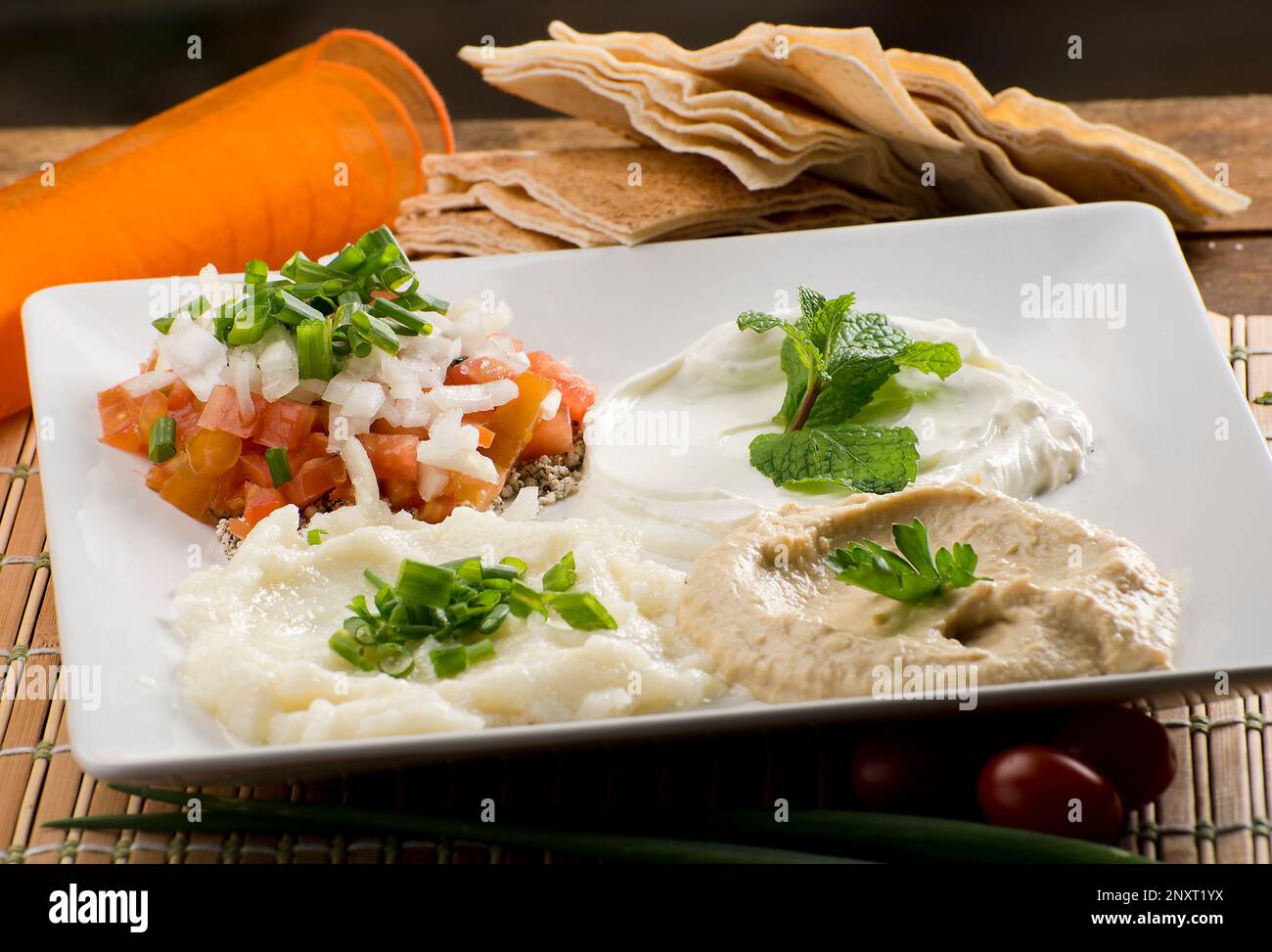 hommos, labneh, chancliche, garlic paste, arab food Stock Photo - Alamy