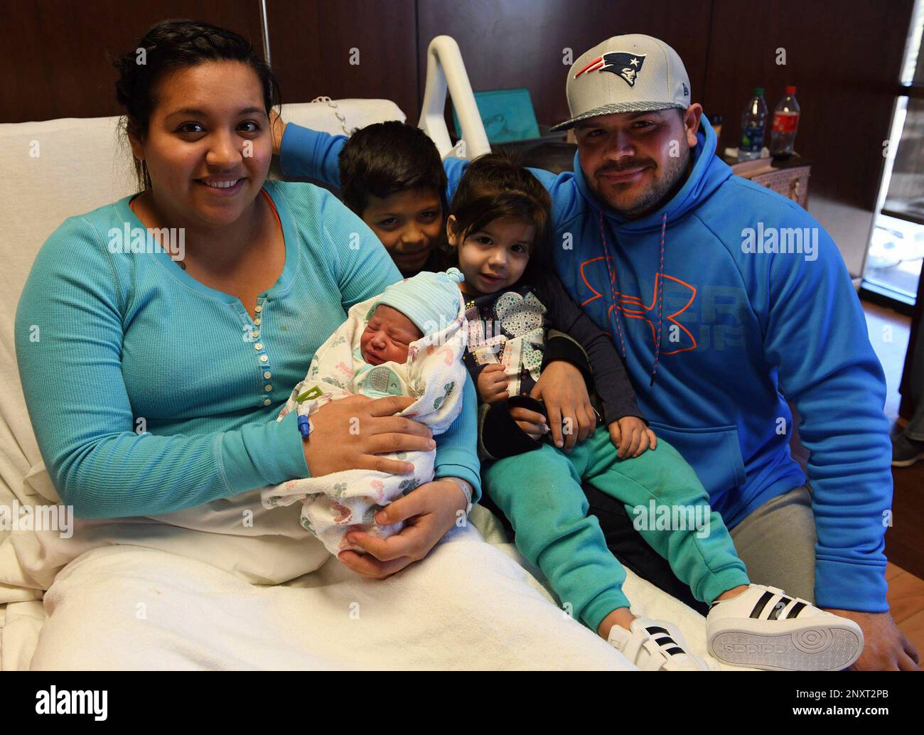 The Navarrete family gathers around new member Ezio Navarrete, born Jan ...