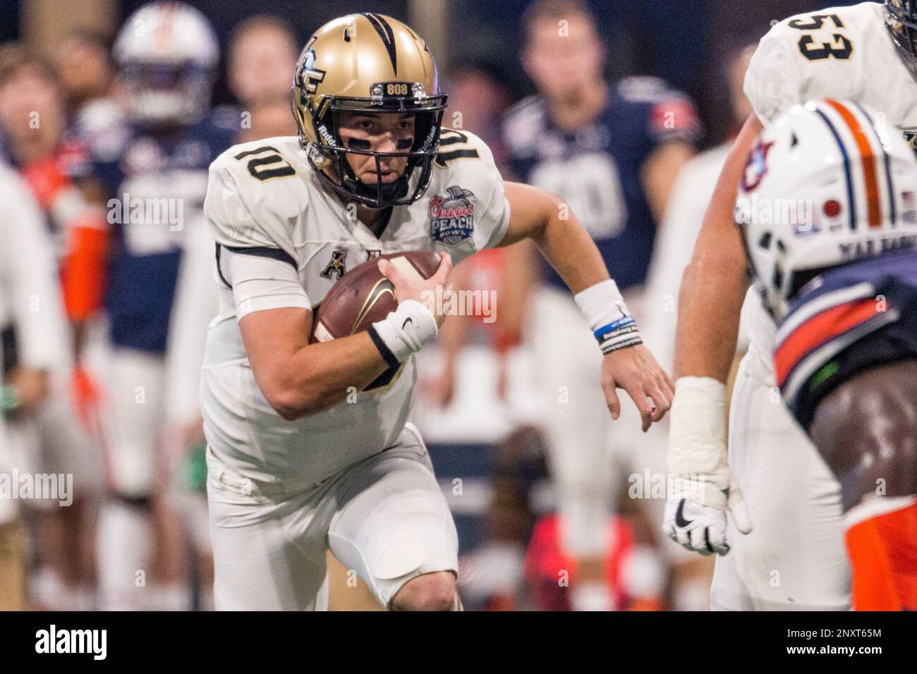 January 1, 2018: UCF Knights quarterback McKenzie Milton (10) scrambles ...